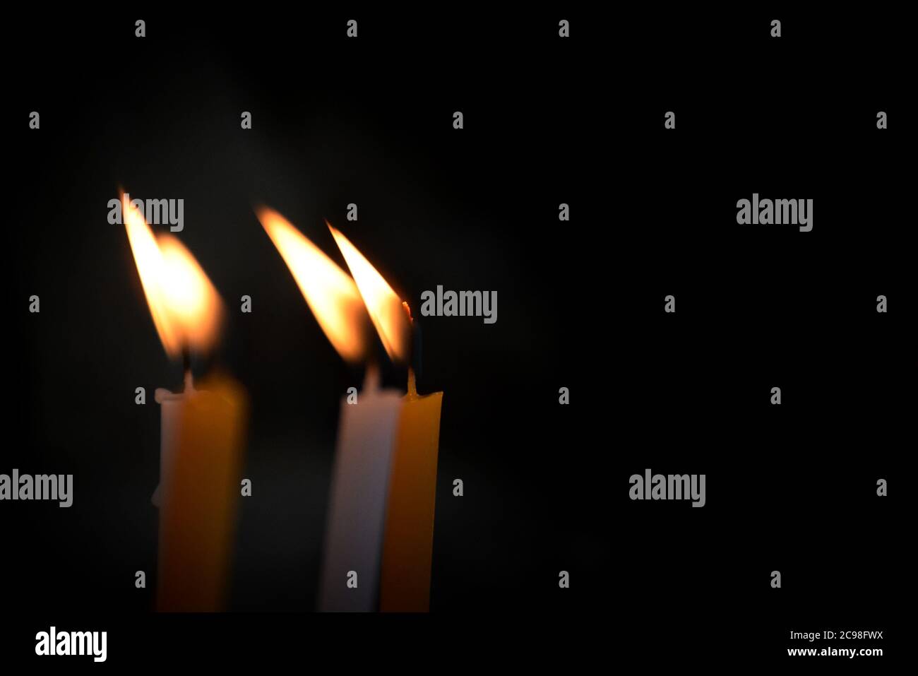 Candle light candle kindle flame with copyspace Stock Photo - Alamy