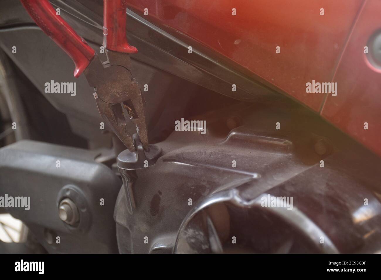 Work With Locking Pliers for open Lubricant oil cap with Morning light ...