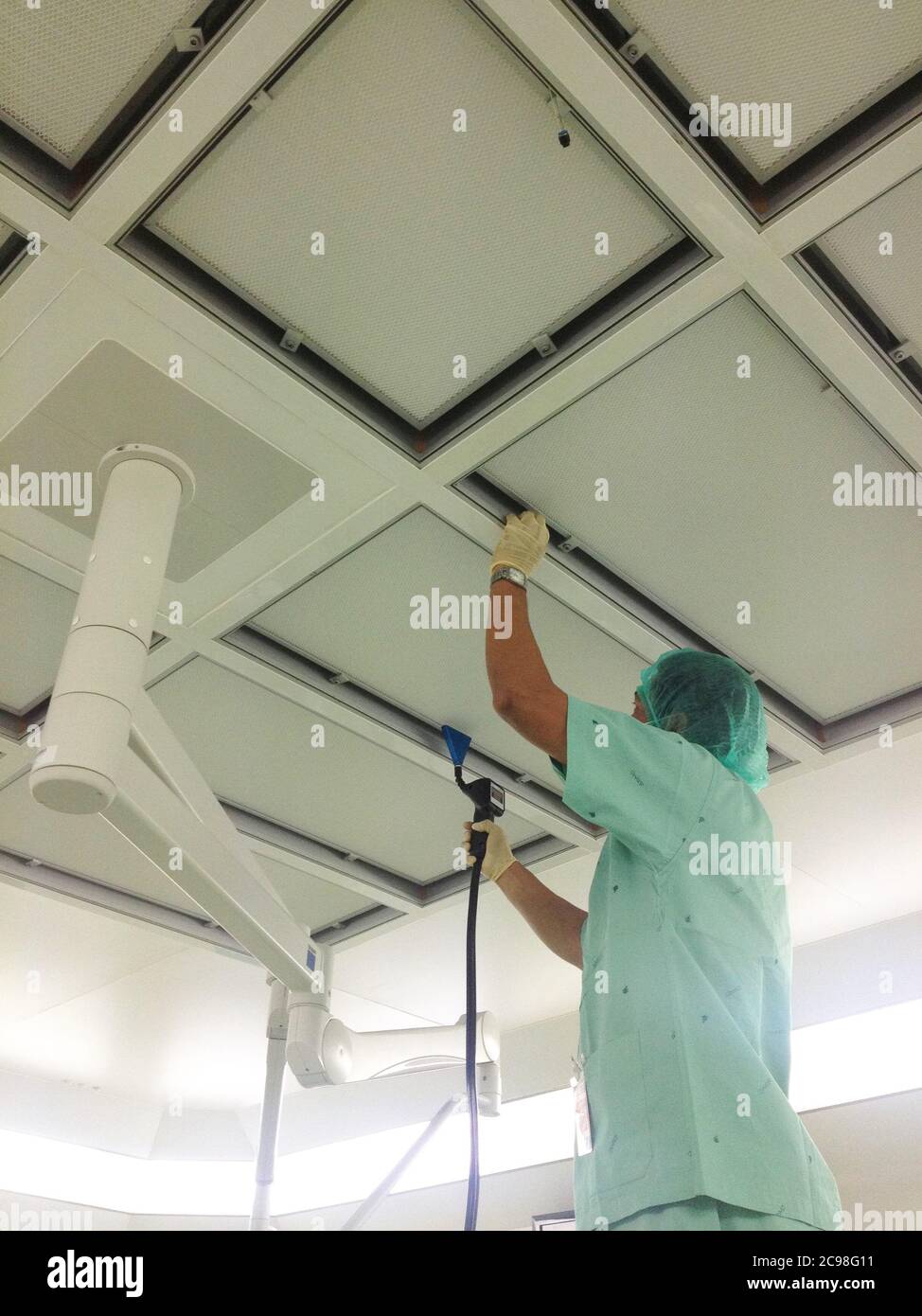 Technician Air Leak Testing in Operating Room at Hospital Stock Photo ...