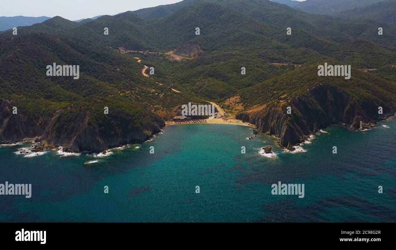 Aerial view of a blue ocean near a cliffy shore at daytime Stock Photo ...