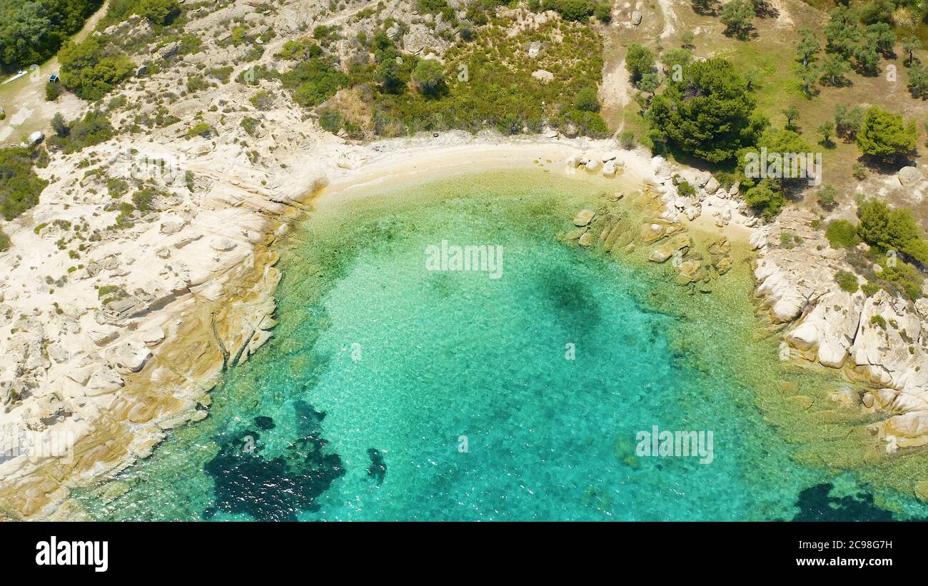Aerial view of a blue ocean near a cliffy shore at daytime Stock Photo ...