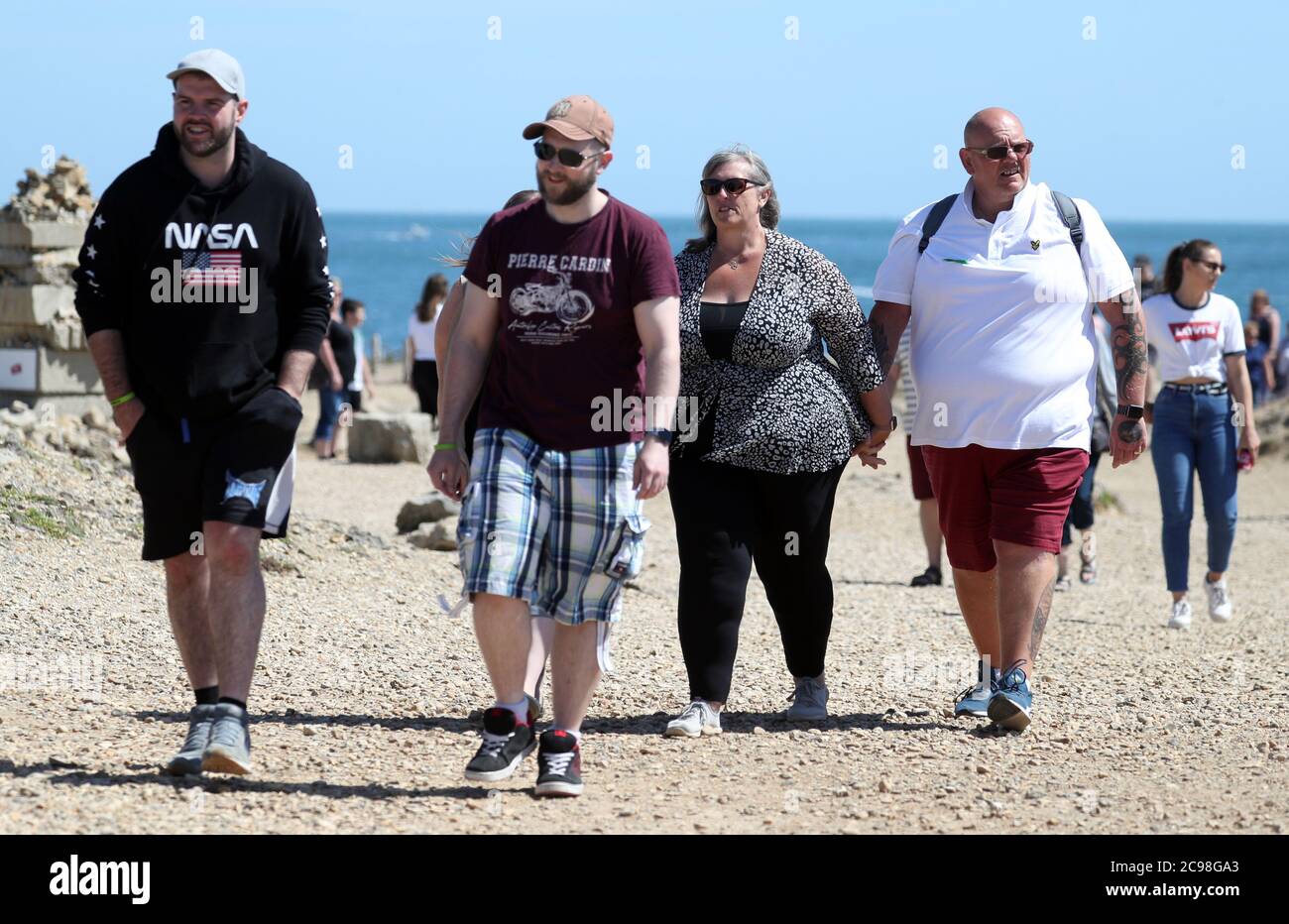 Tim Dunn (far right) and his wife Tracey Dunn (second right), as they ...