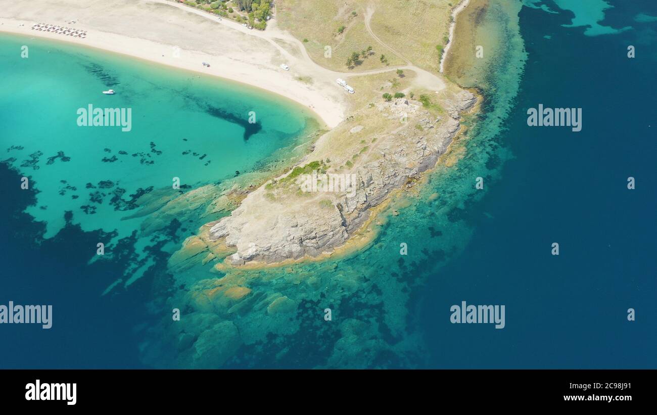 Aerial view of a blue ocean near a cliffy shore at daytime Stock Photo ...
