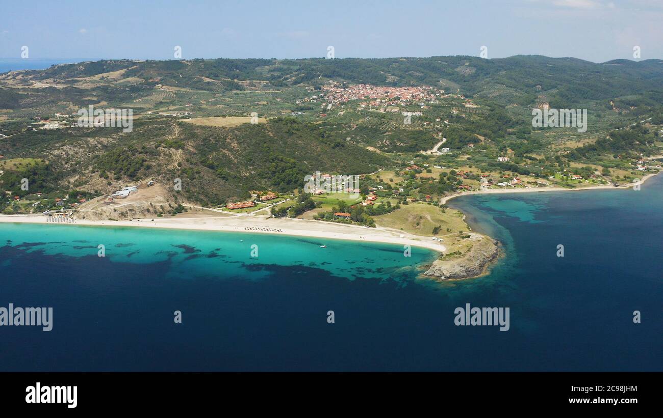 Aerial view of a blue ocean near a cliffy shore at daytime Stock Photo ...