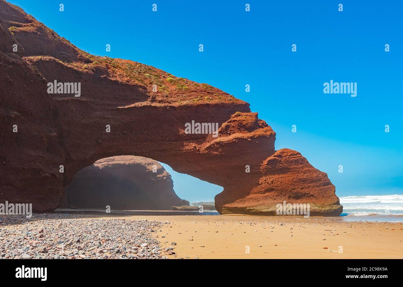 Red arches rocky beach hi-res stock photography and images - Alamy