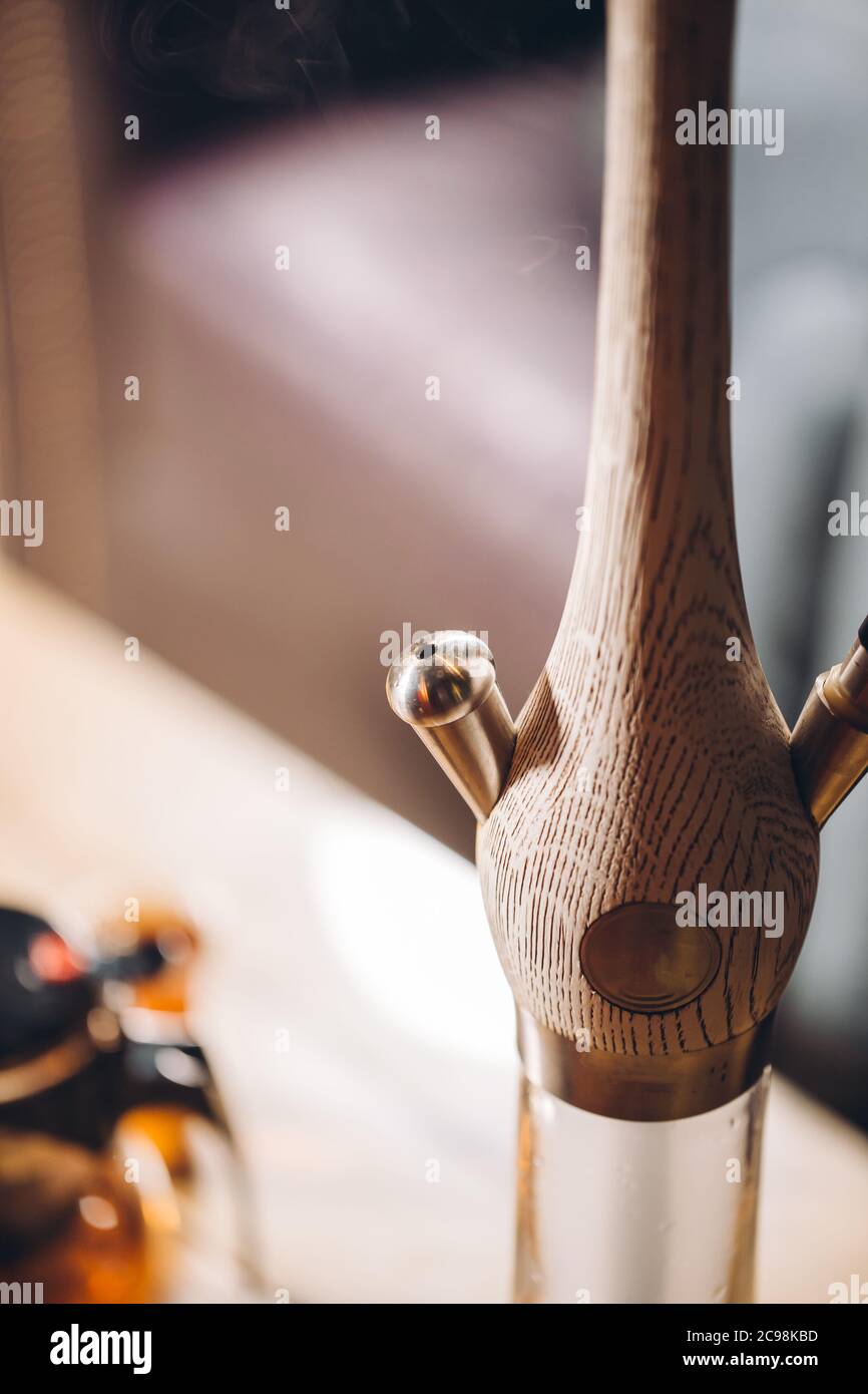 close up photo of a modern hookah. cropped photo. apparatus for smoking ...