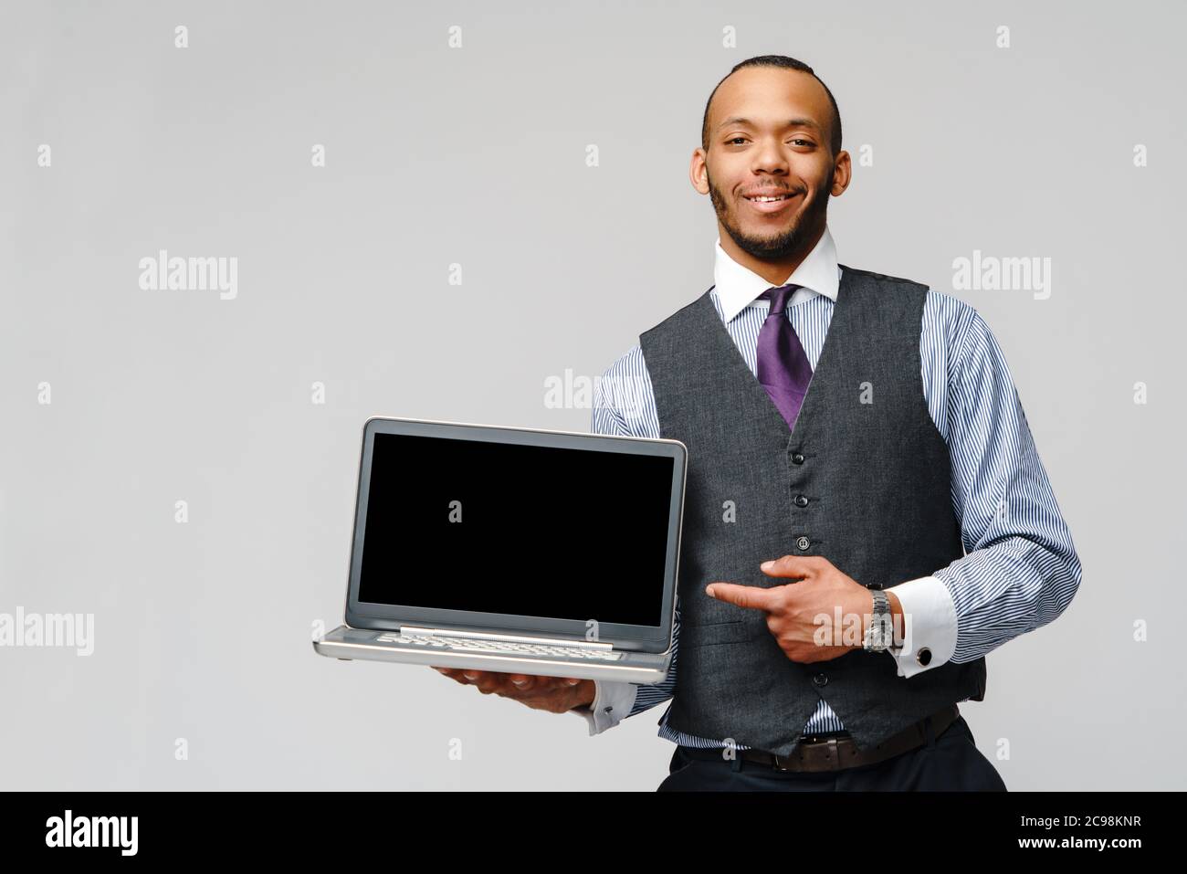 professional african-american business man holding laptop computer ...