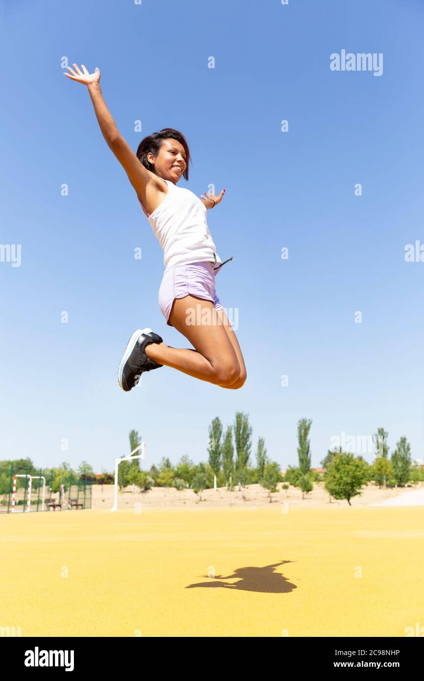 Lady jumping exercise hi-res stock photography and images - Alamy
