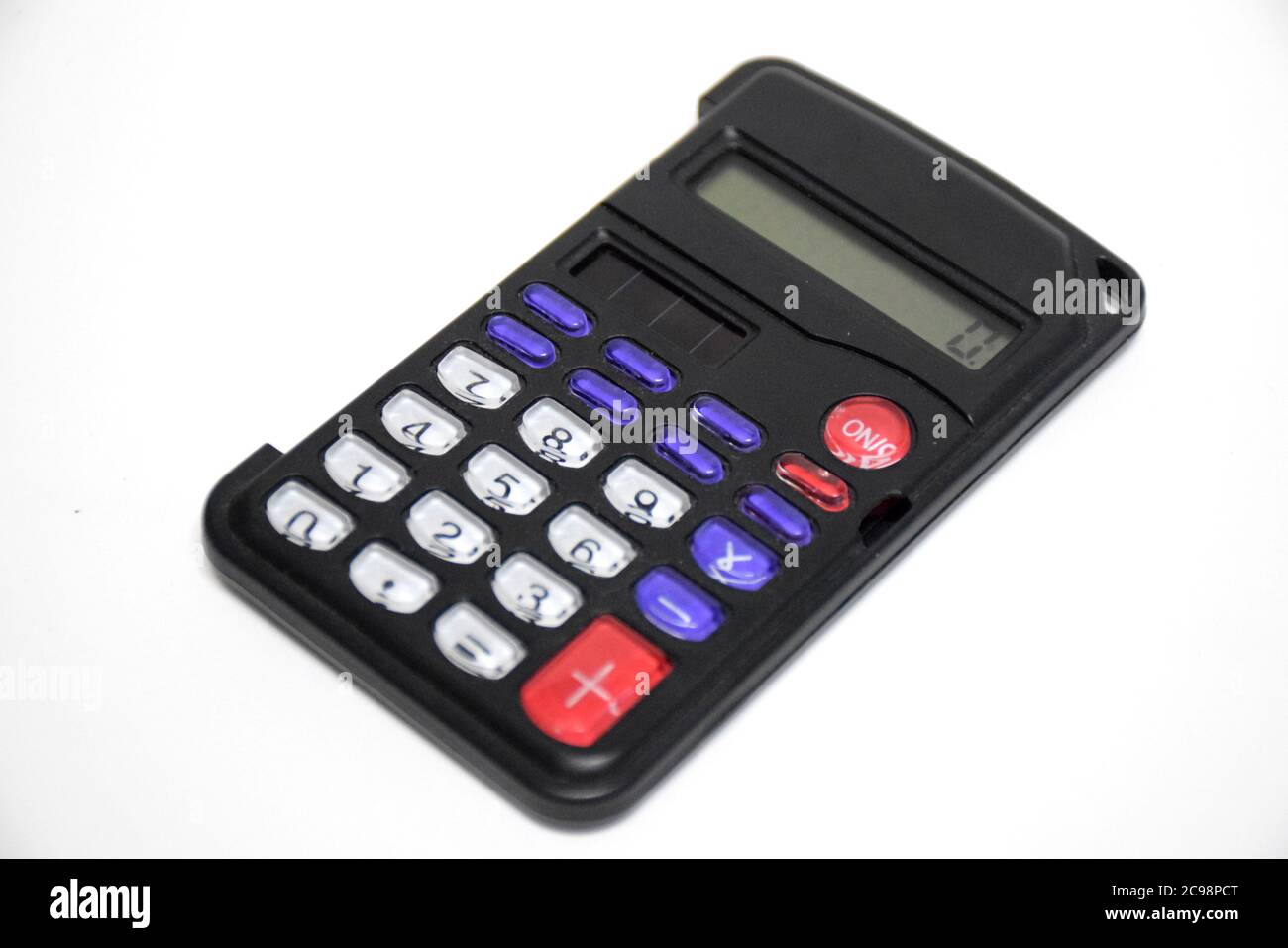 The mini calculator isolated on white background Stock Photo - Alamy