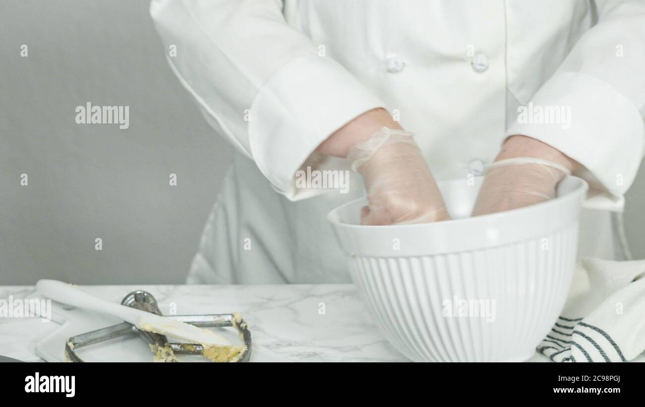 Step by step. Mixing ingredients in standing kitchen mixer to bake ...