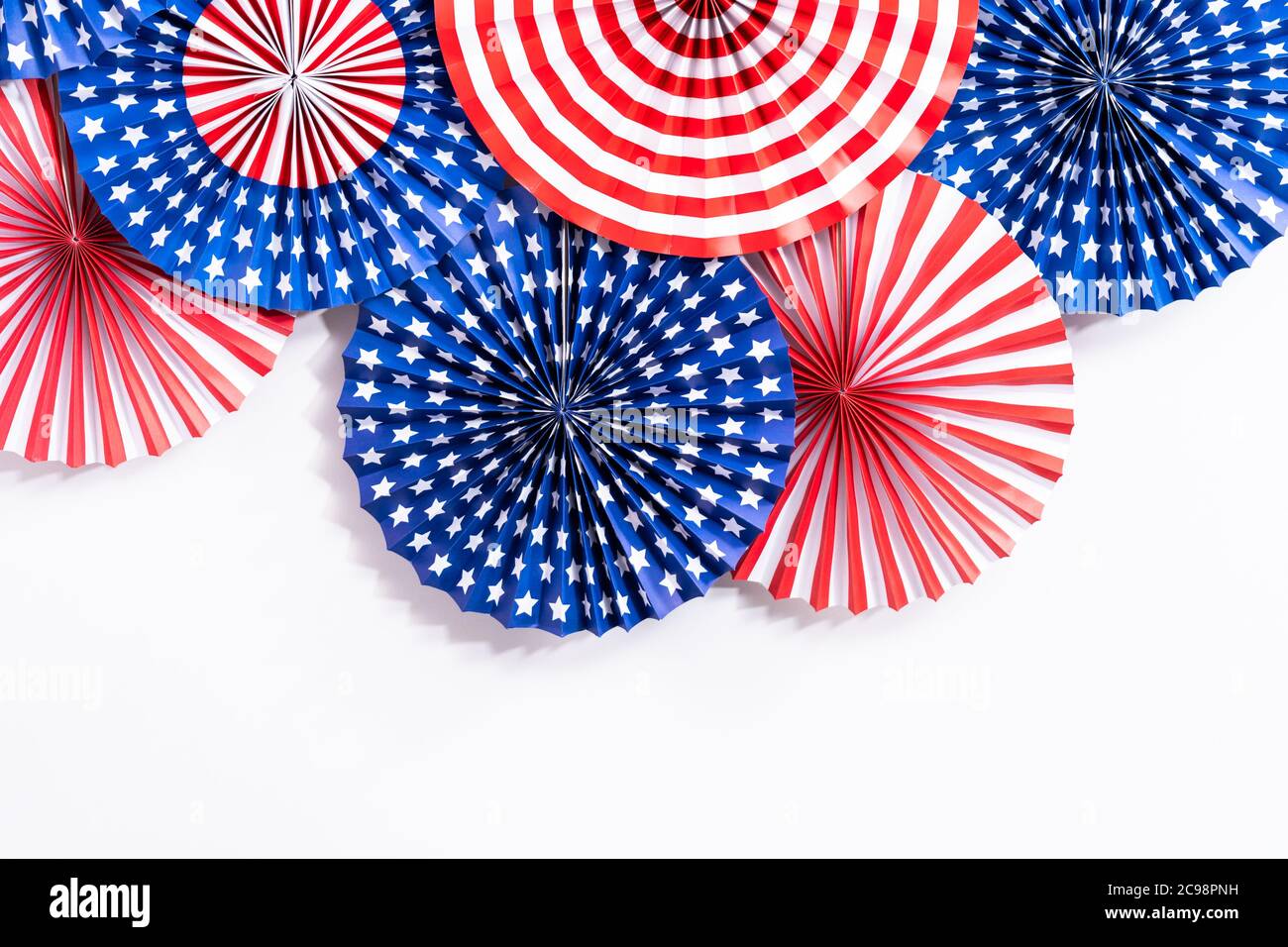 Red, white, and blue paper fans for July 4th celebration Stock Photo ...