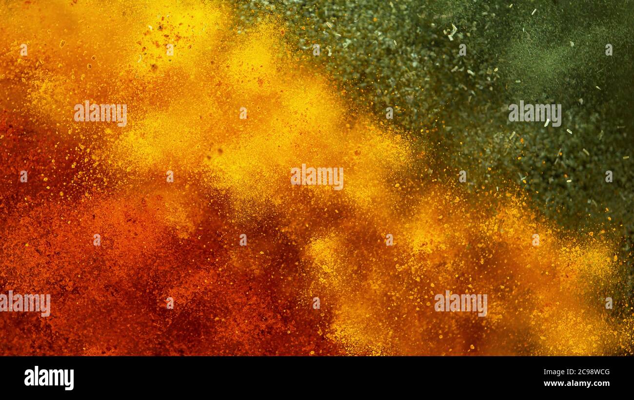 Freeze motion of various spice explosion, abstract culinary background ...