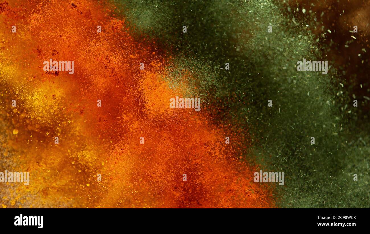 Freeze motion of various spice explosion, abstract culinary background ...