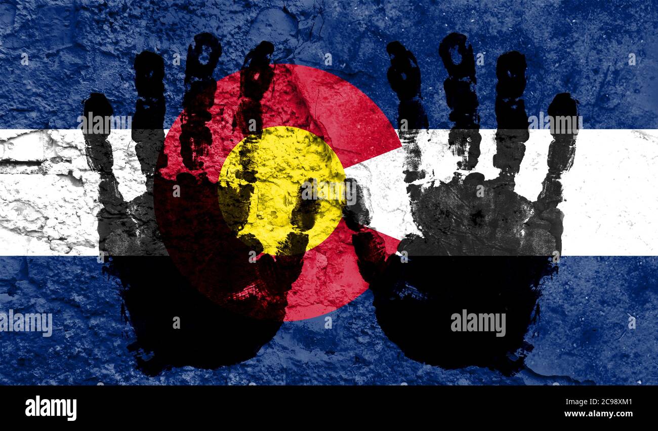 Handprints on the background of the flag of State of Colorado. Freedom ...