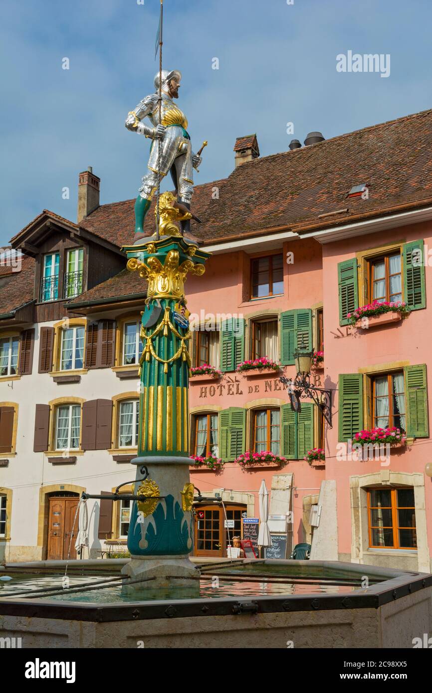 Switzerland, Neuchatel Canton, Le Landeron, fountain with banneret ...