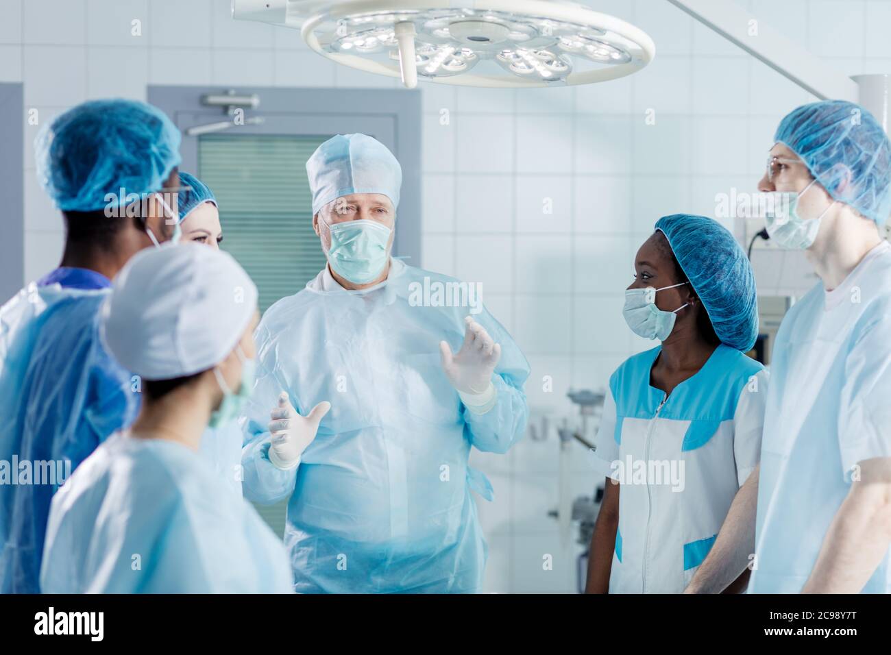 talented professional senior doctor sharing his knowledge, experience ...