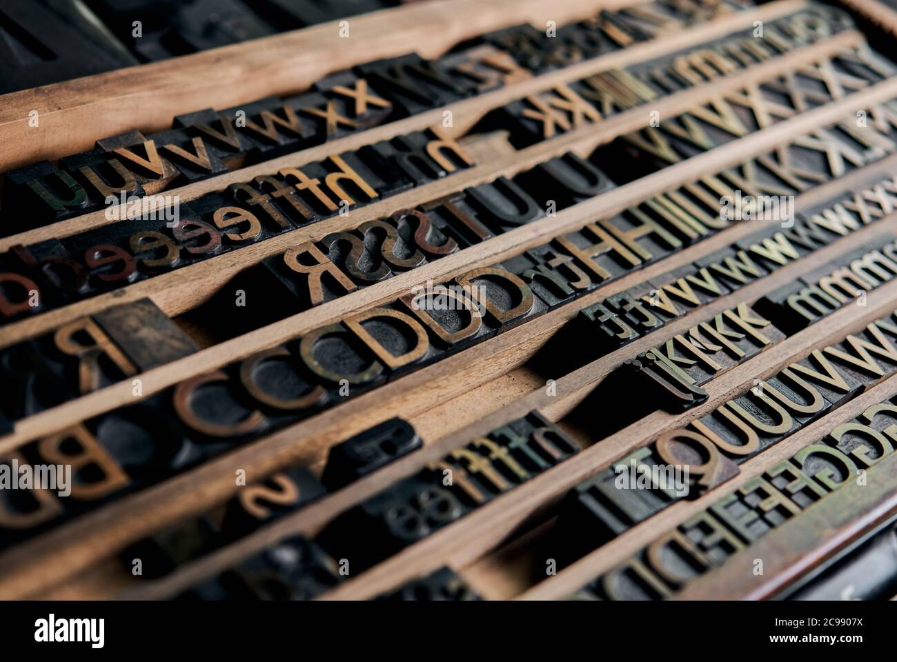A letterpress printing workshop with letter cases on display Stock ...