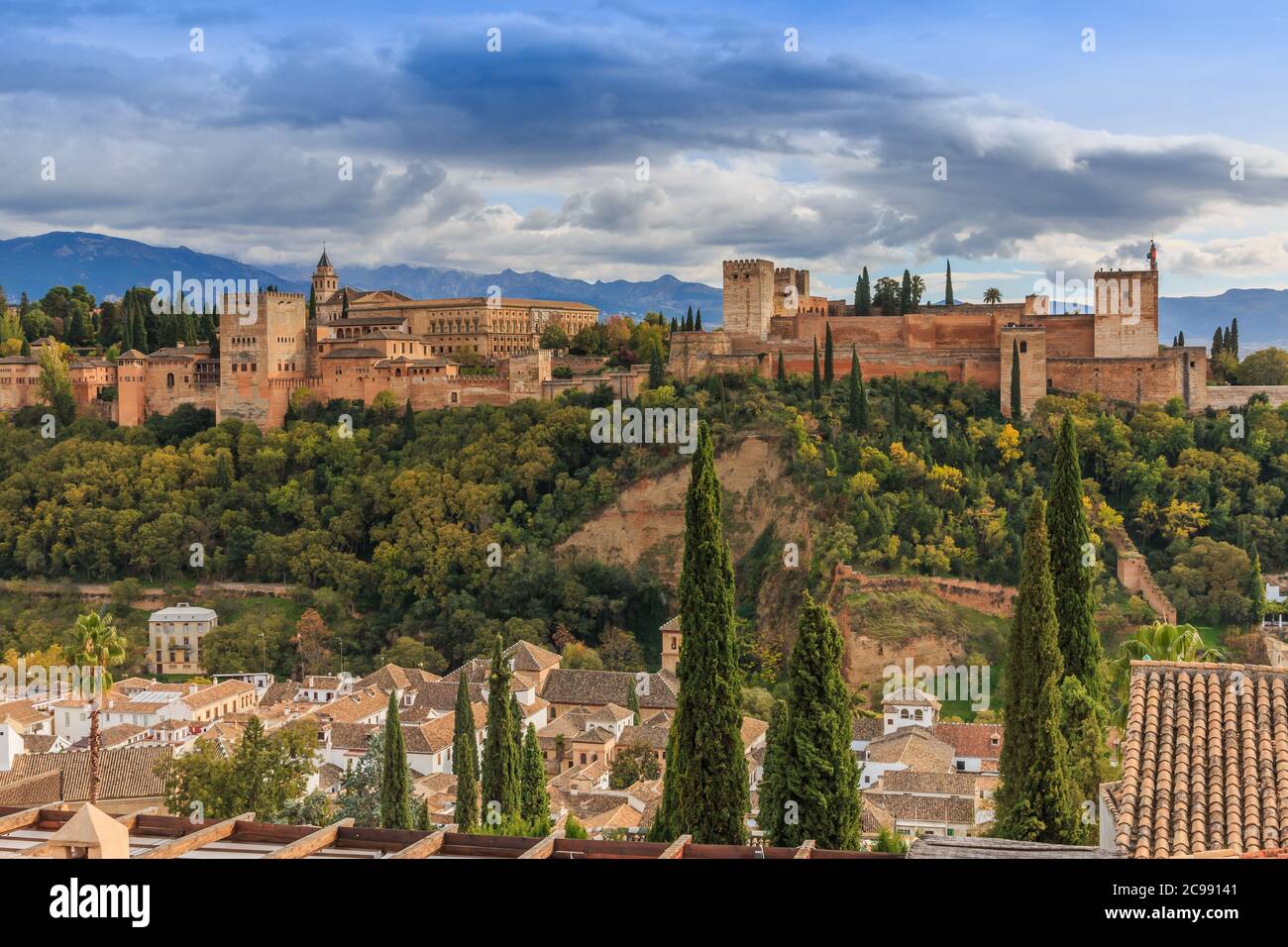 Spanish city of Granada in Andalusia with clouds and mountains in the ...
