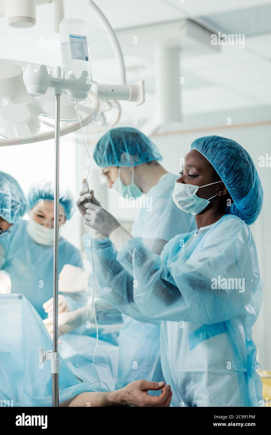 talented skilled doctors perform a successful procedure.close up photo ...
