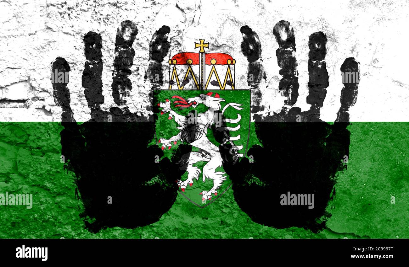 Handprints on the background of the flag of Styria. Freedom of choice ...