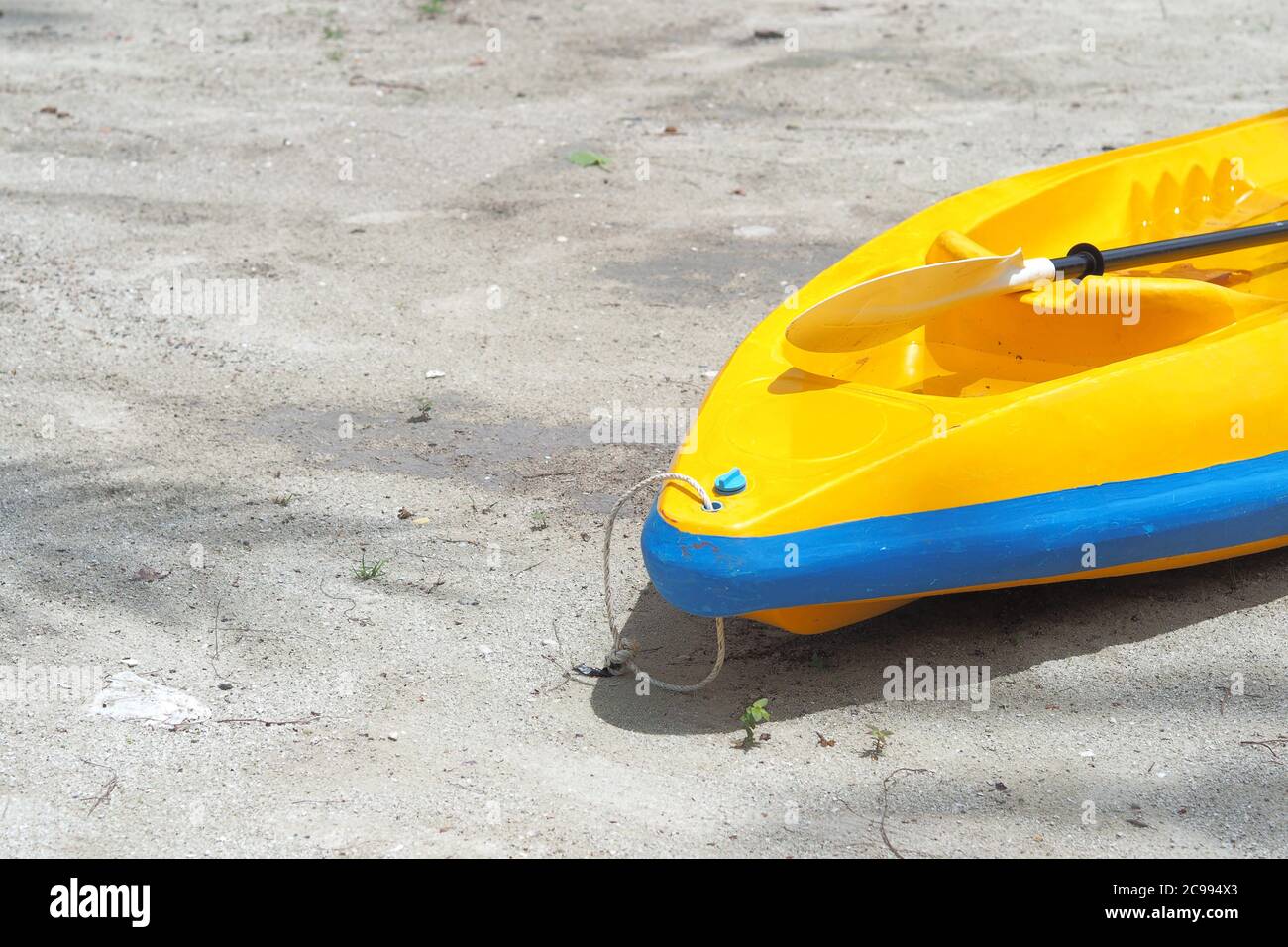 Yellow Kayak with Sun light on the Beach Stock Photo - Alamy