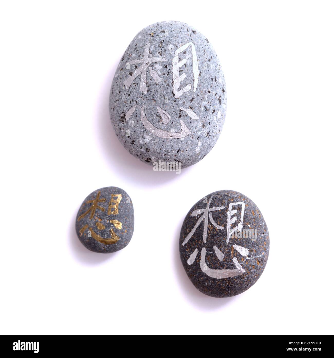 Chinese or Japanese symbol meaning think or miss, painted on volcanic ...