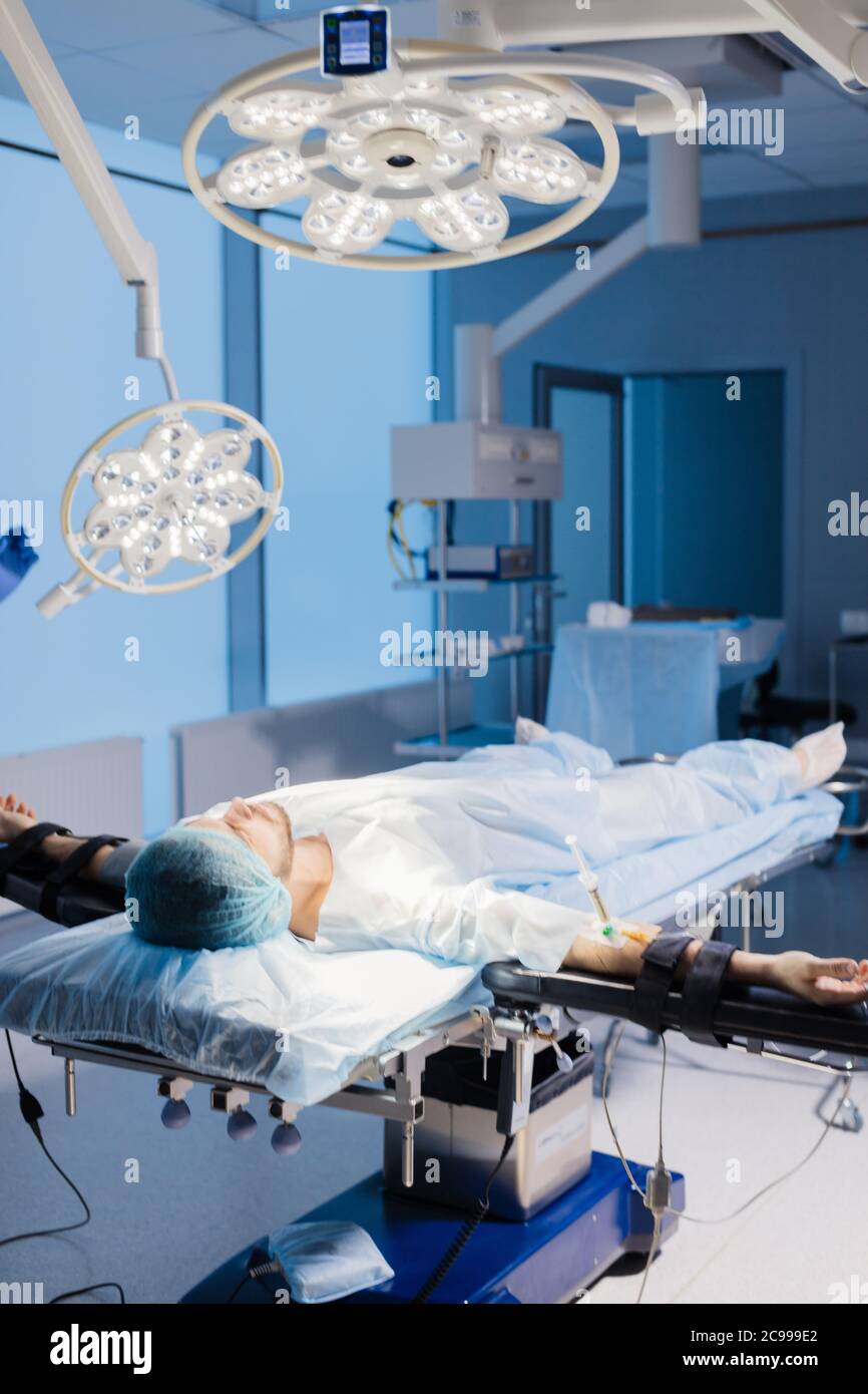 Male Patient prepared by a team of anesthetists for abdominal surgery ...