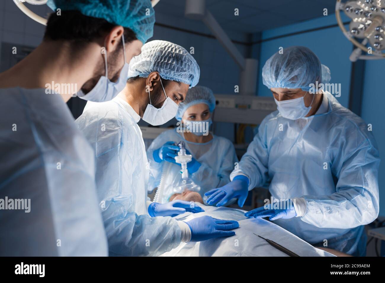 Surgery time at Clinical Hospital. Team of surgeons at work. Complex ...