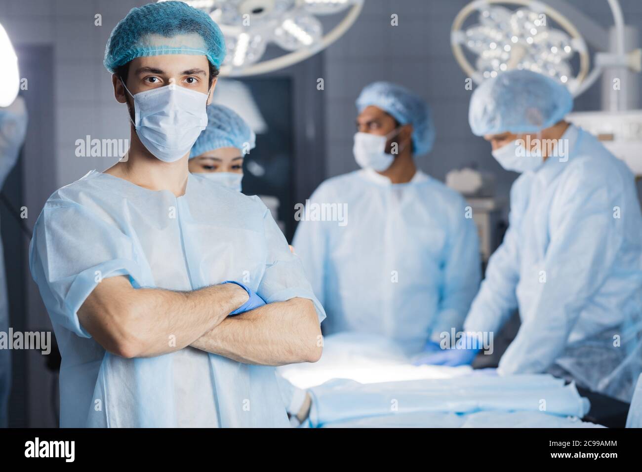Bearded caucasian surgeon in surgical hi-res stock photography and ...