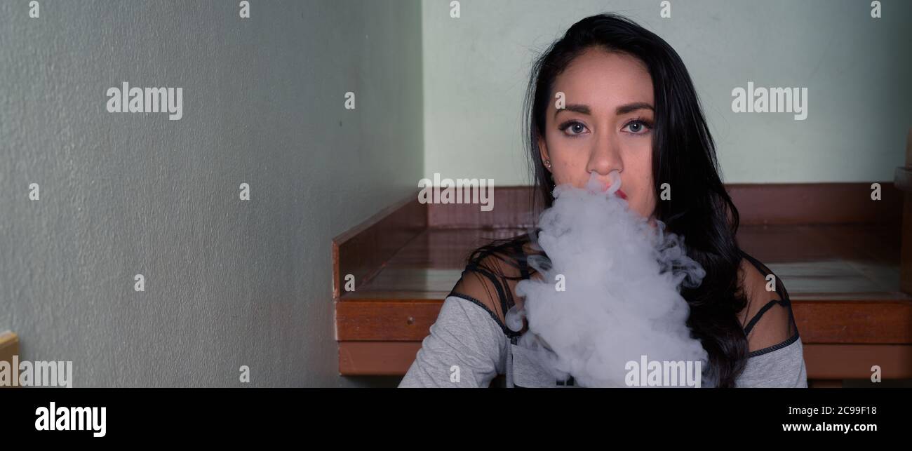 Woman vaping hi-res stock photography and images - Alamy