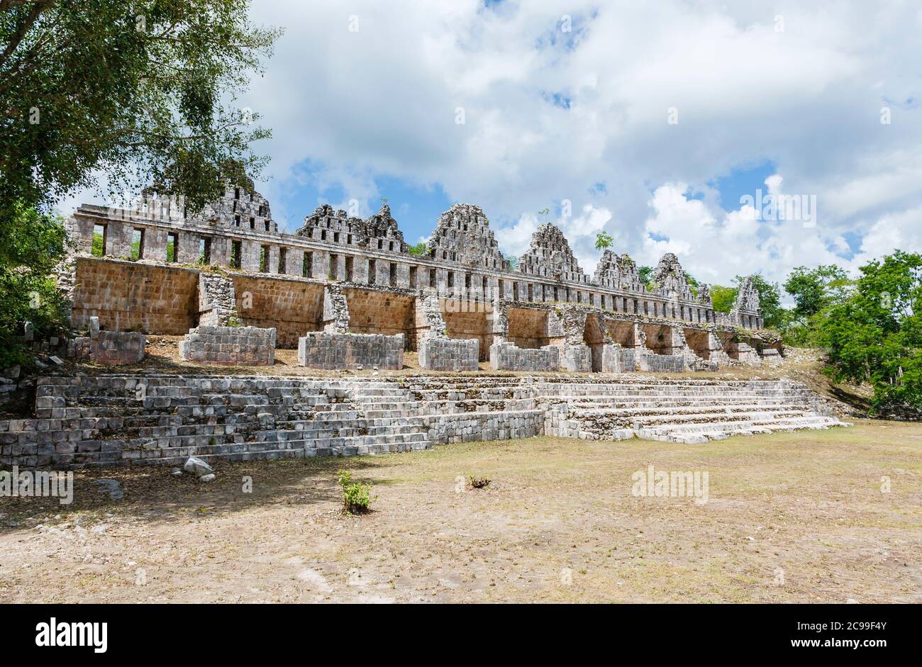 Ruined walls in The Dovecote area at Uxmal, an ancient Mayan city and ...