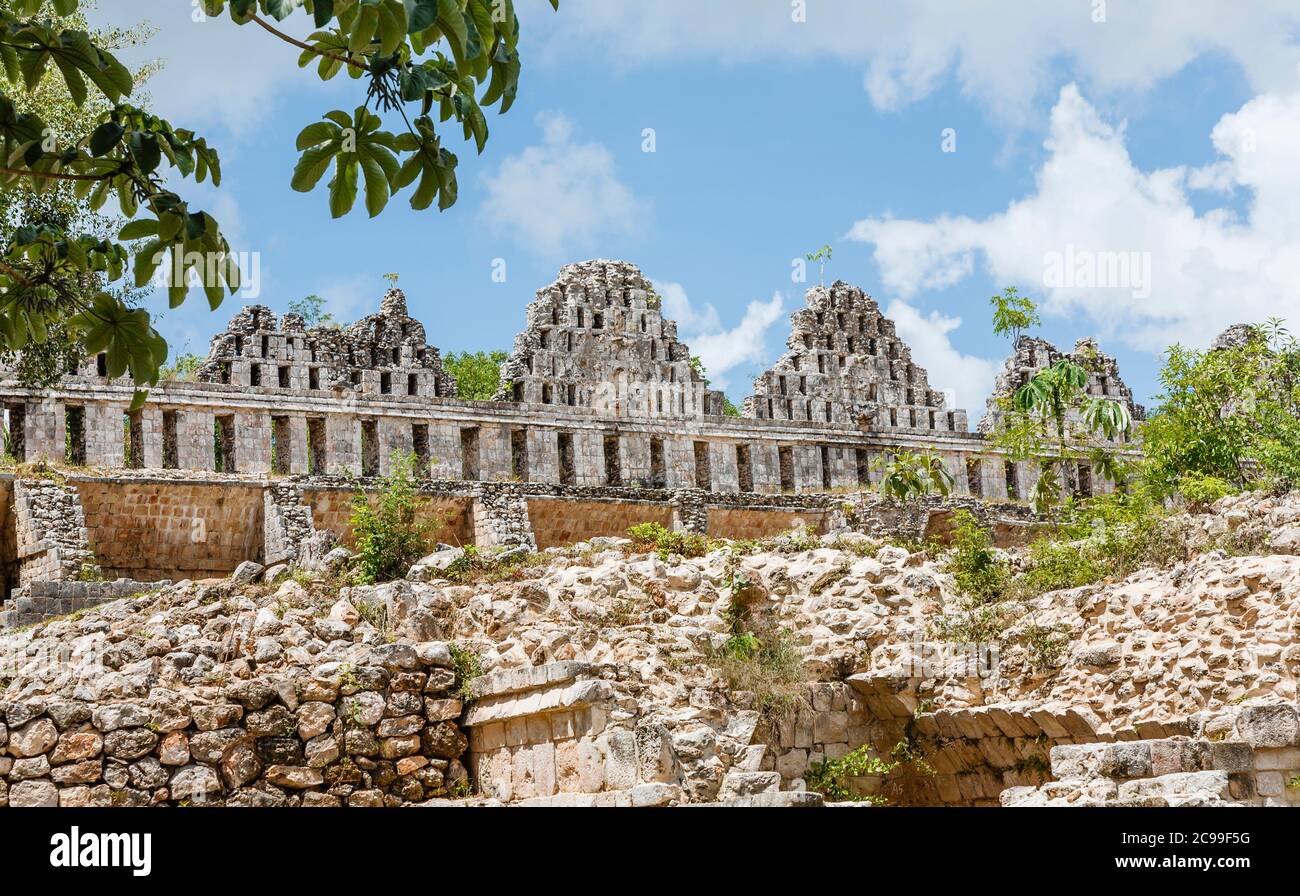 Ruined walls in The Dovecote area at Uxmal, an ancient Mayan city and ...