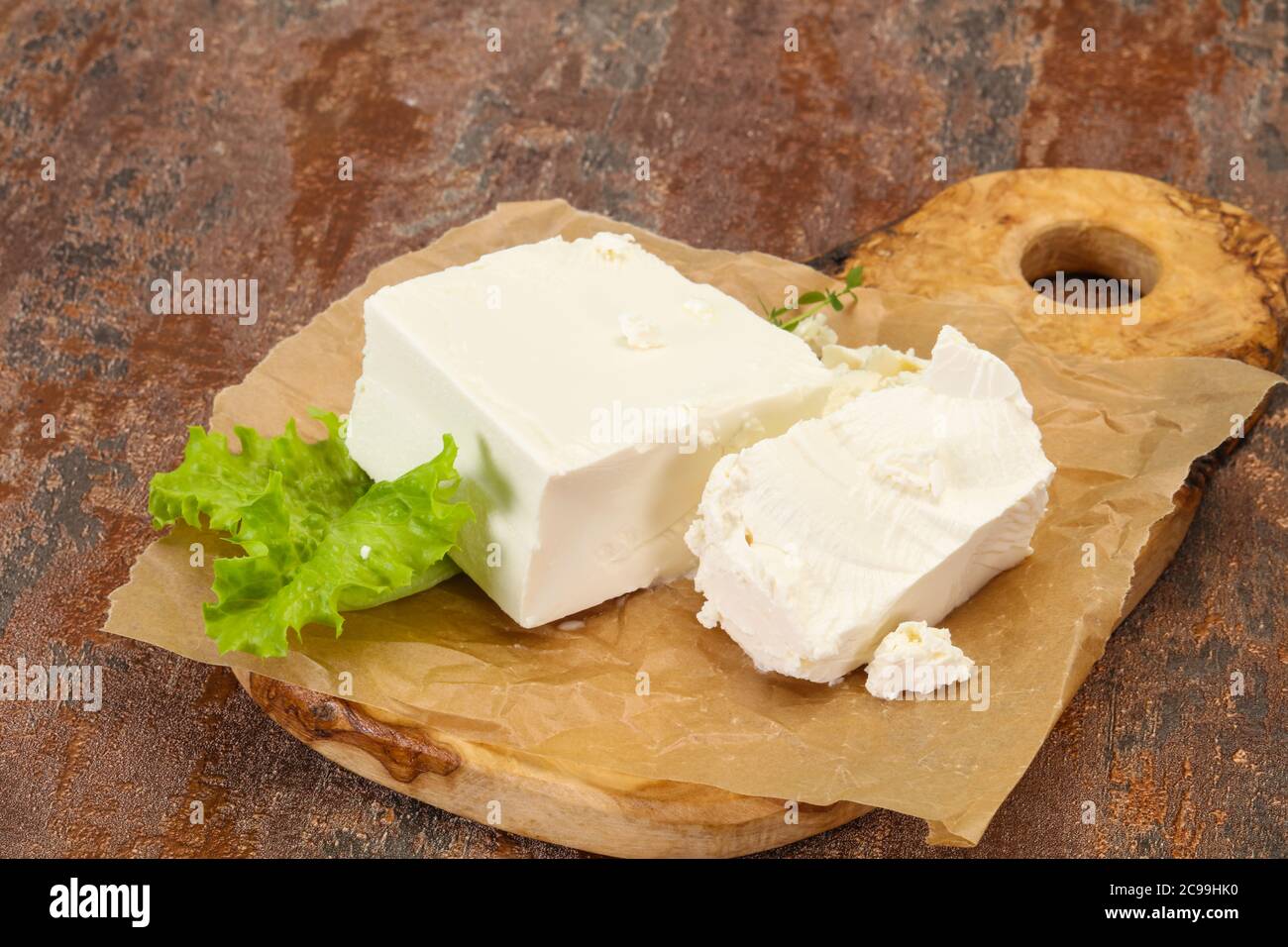 Greek traditional Feta soft cheese in the plate Stock Photo - Alamy