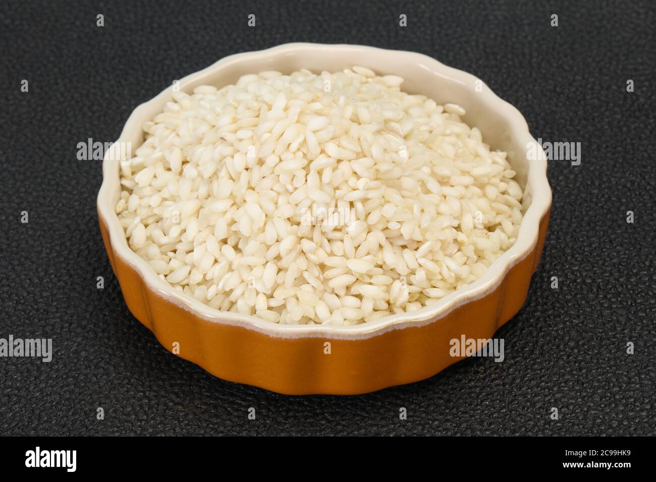 Raw Arborio rice for Italian risotto Stock Photo - Alamy