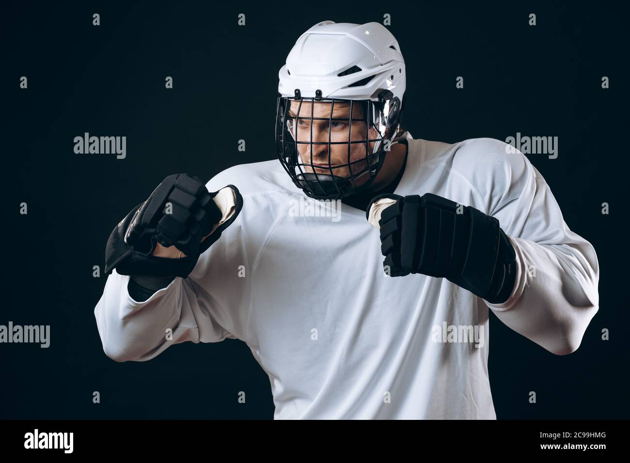 Emotional outraged ice-hockey player man gestures angrily, being ...