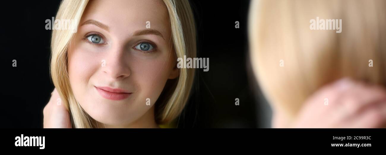 Charming lady and reflection Stock Photo - Alamy