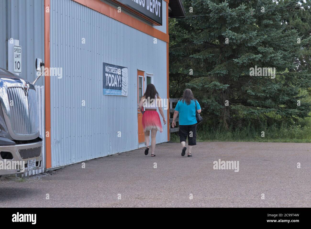 Two business executives walking hi-res stock photography and images - Alamy