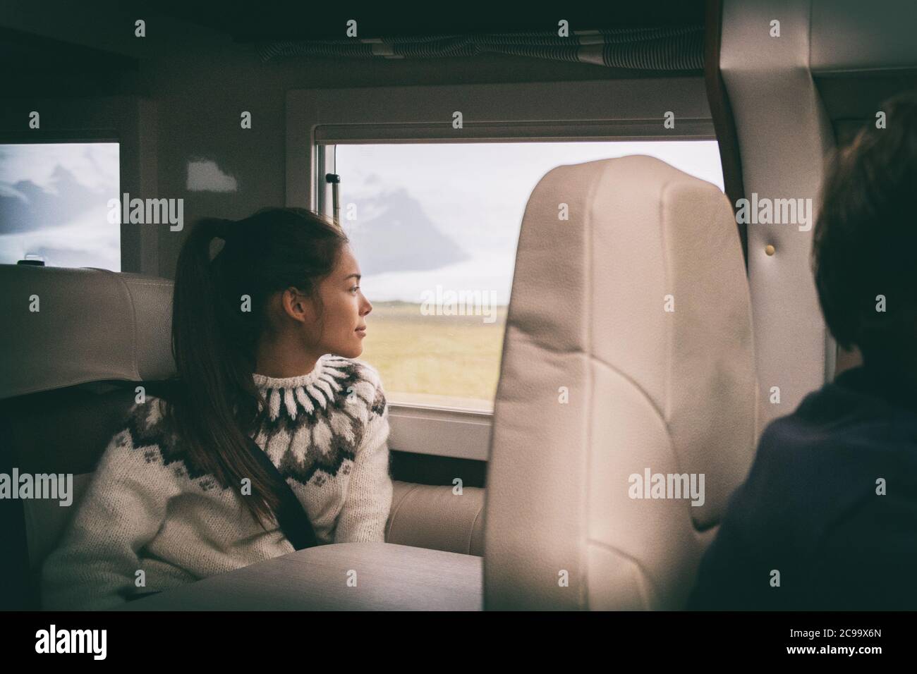 RV camper van travel Asian girl sitting in back of motorhome car on ...