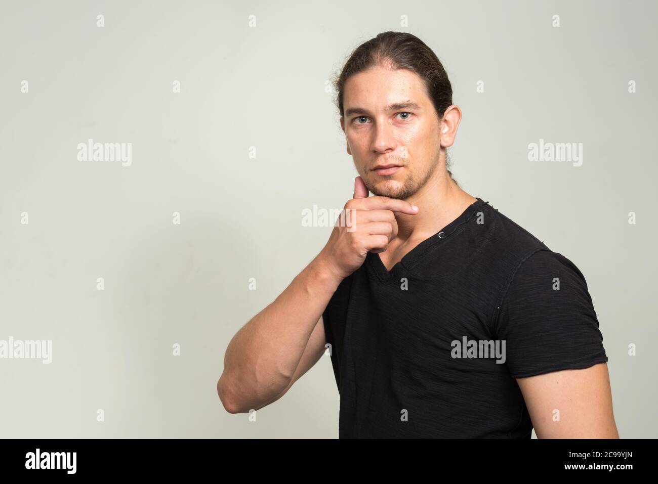 Portrait of handsome bearded man with long hair Stock Photo - Alamy