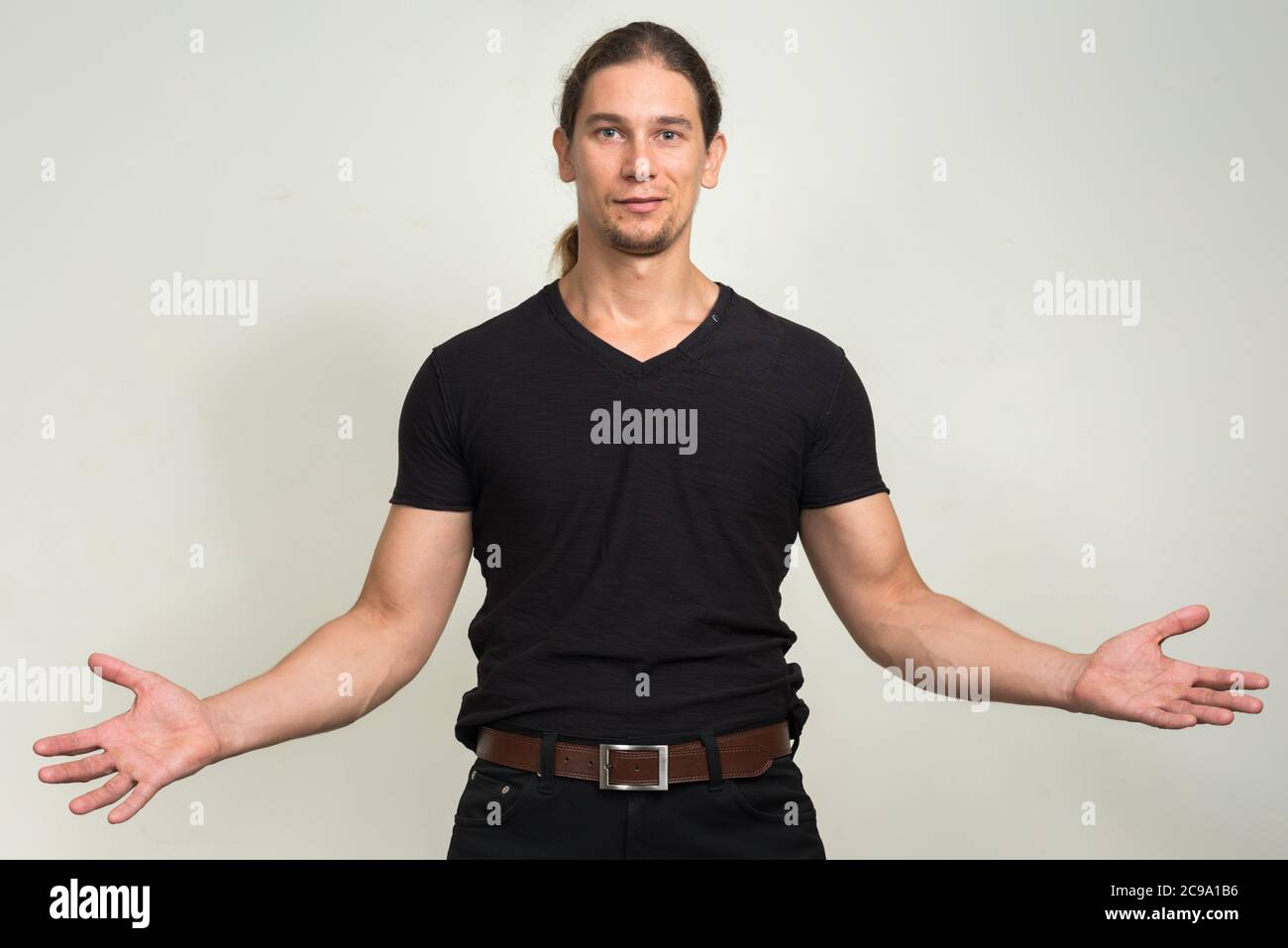 Portrait of handsome bearded man with long hair Stock Photo - Alamy