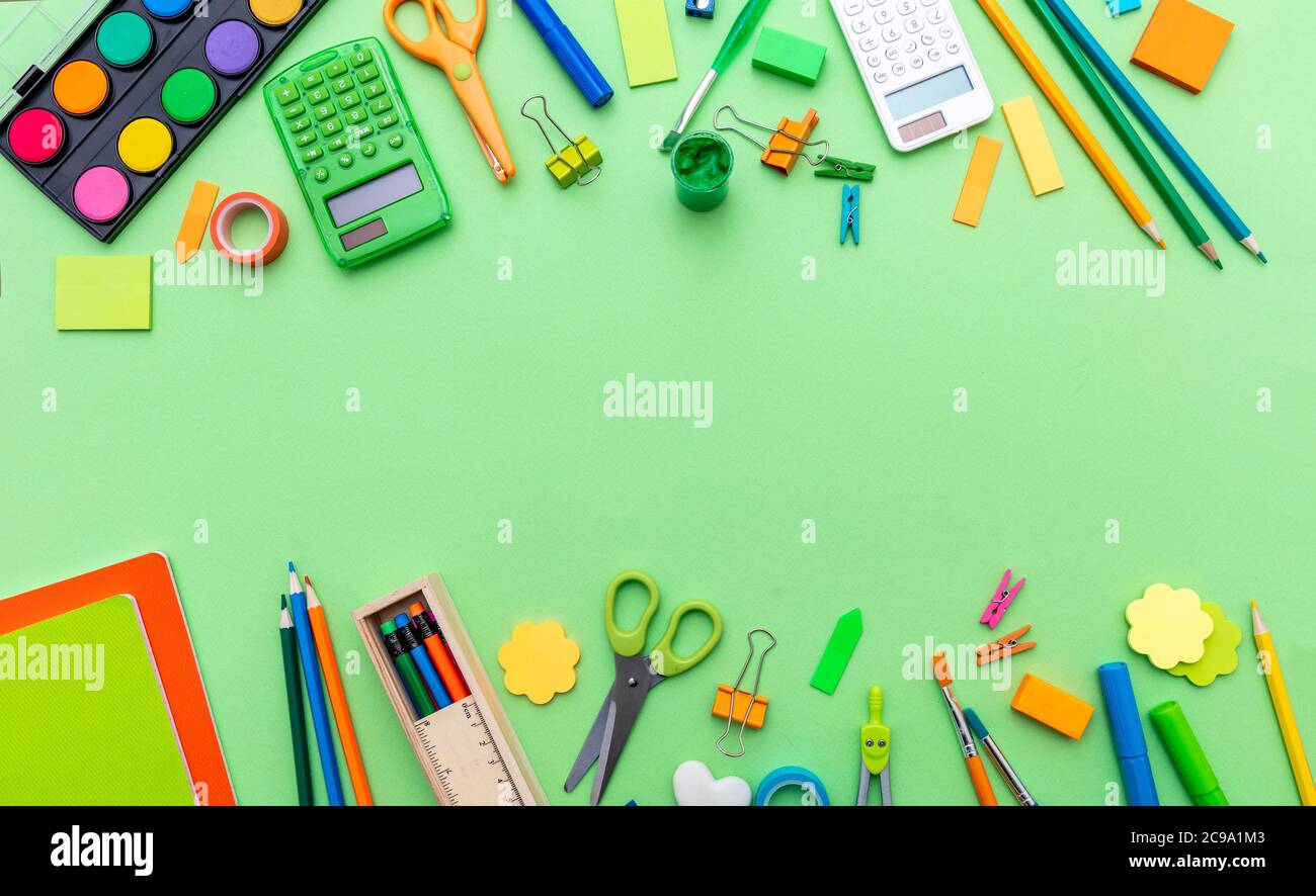 School supplies. Stationery double border on green color background ...