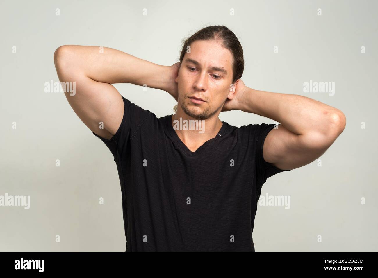 Portrait of handsome bearded man with long hair Stock Photo - Alamy
