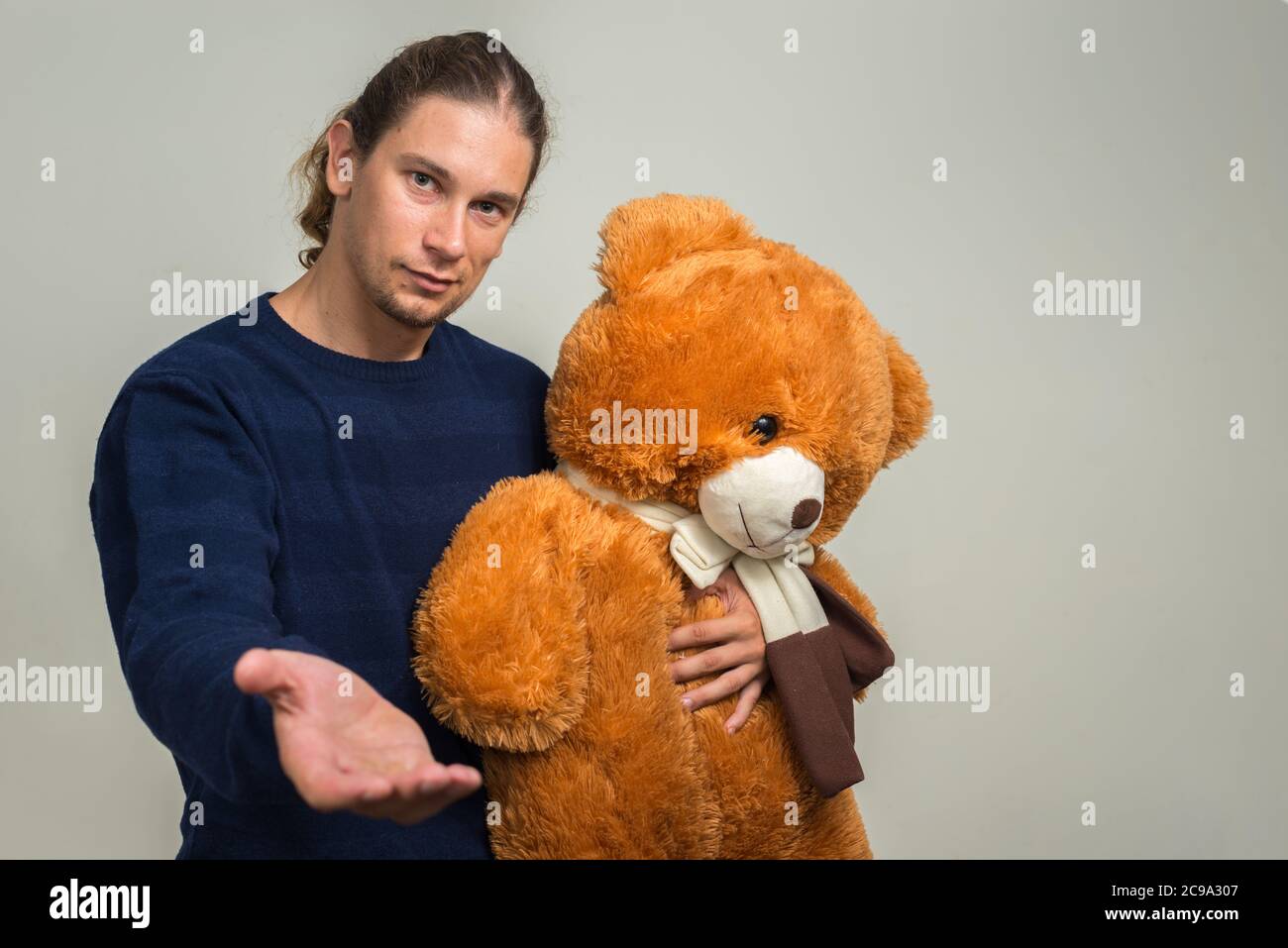 Portrait of handsome bearded man with long hair Stock Photo - Alamy