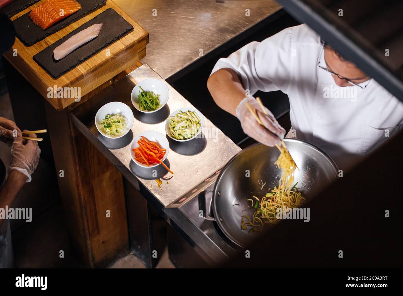 top view cropped photo of working chef in the Chinese restaurant Stock ...