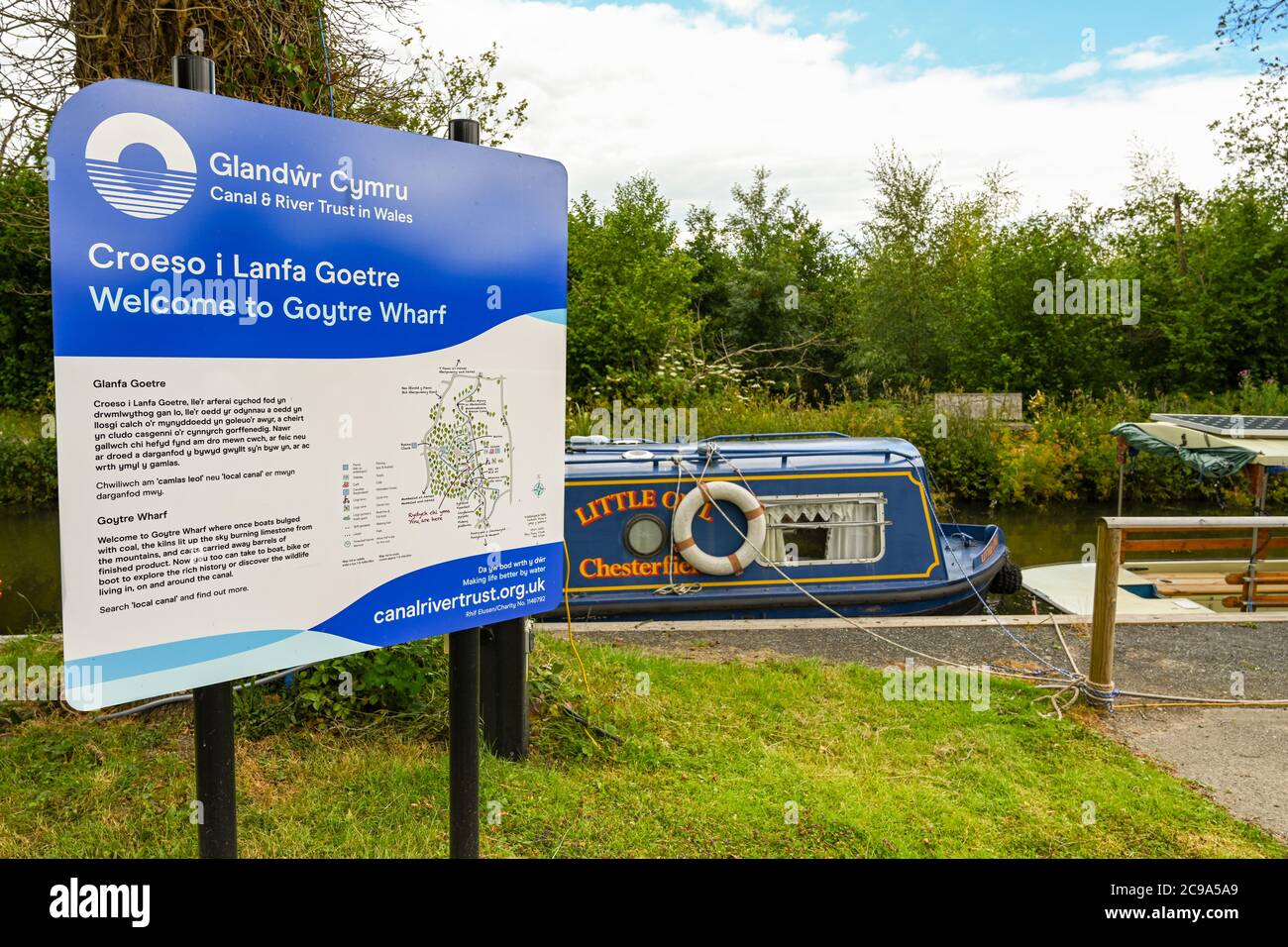 Goytre Wharf, Wales - July 2020: Sign and narrow boat on the Brecon and ...