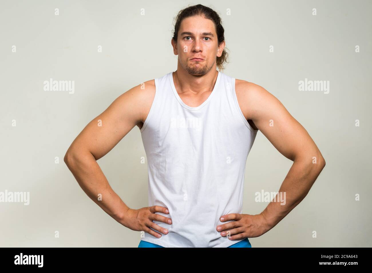 Portrait of handsome bearded man with long hair Stock Photo - Alamy