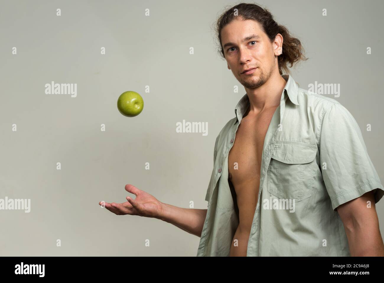Portrait of handsome bearded man with long hair Stock Photo - Alamy