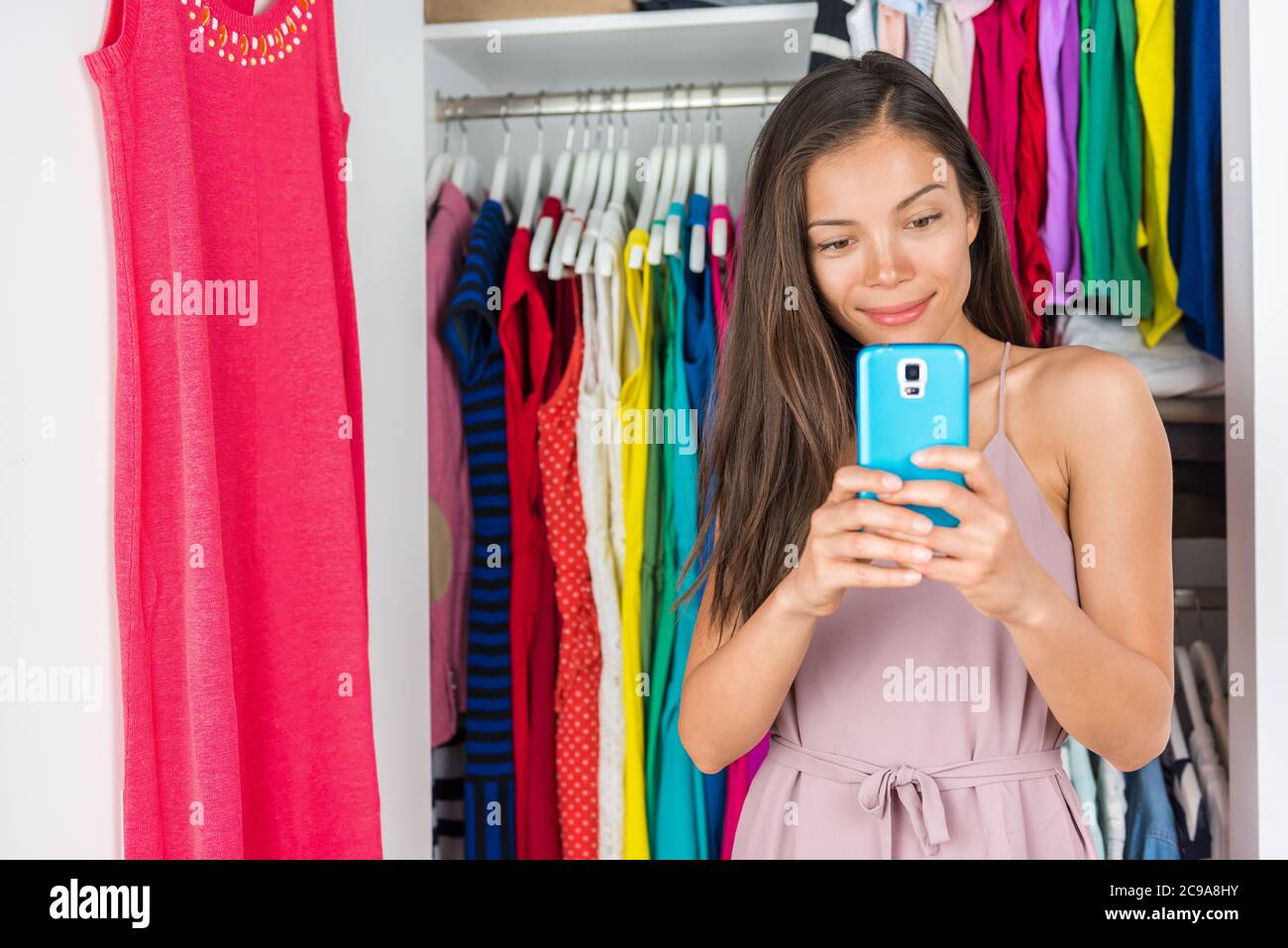 Shopping phone app fashion girl using mobile smartphone to style ...