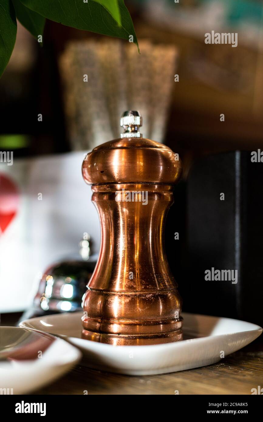 Brown metal pepper shaker. Bronze pepper shaker Stock Photo - Alamy