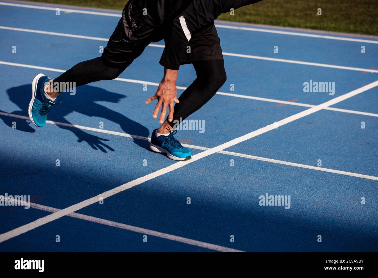 Male runners starting position hi-res stock photography and images - Alamy